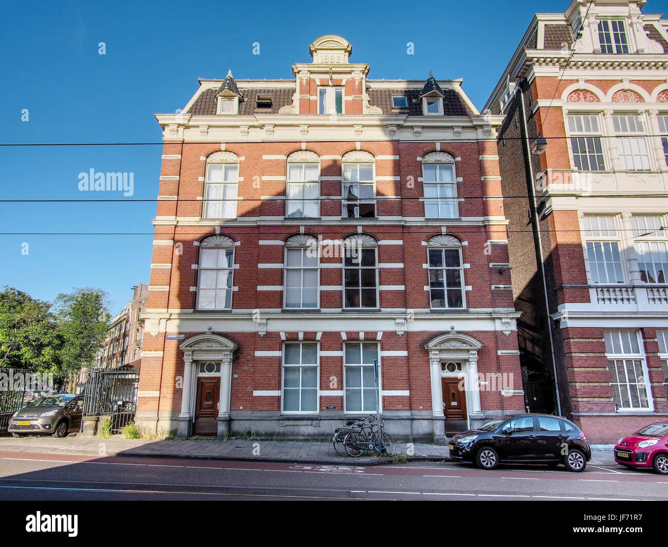 Marnixstraat in Amsterdam, with buildings numbered 309-315, reflecting ...