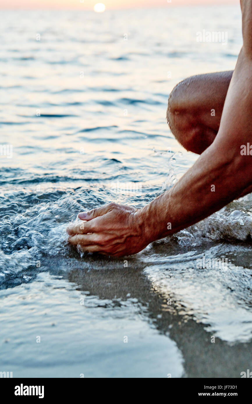 Touching water hi-res stock photography and images - Alamy