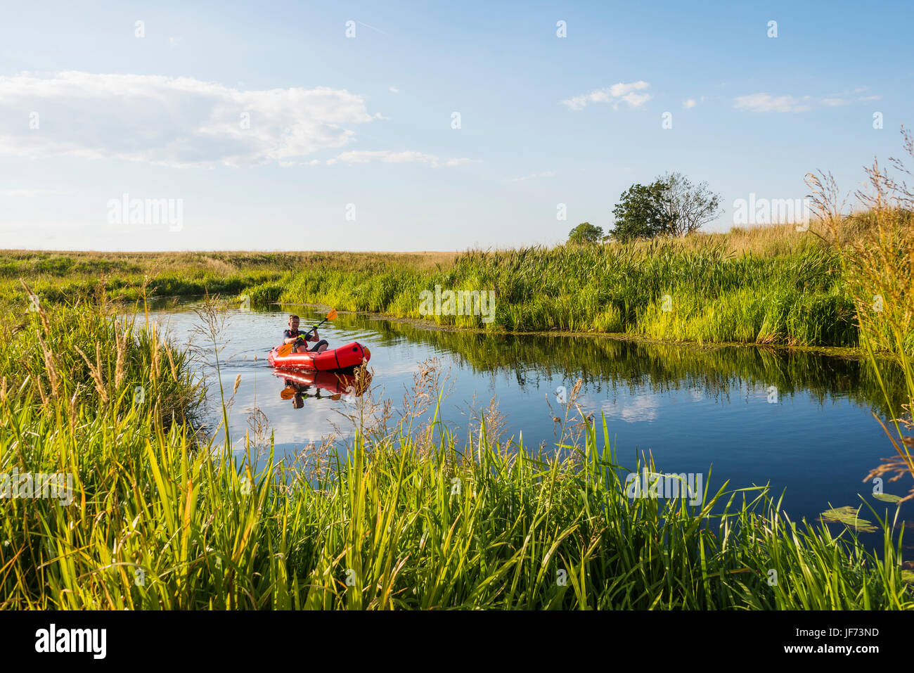 Man rafting on river Stock Photo - Alamy