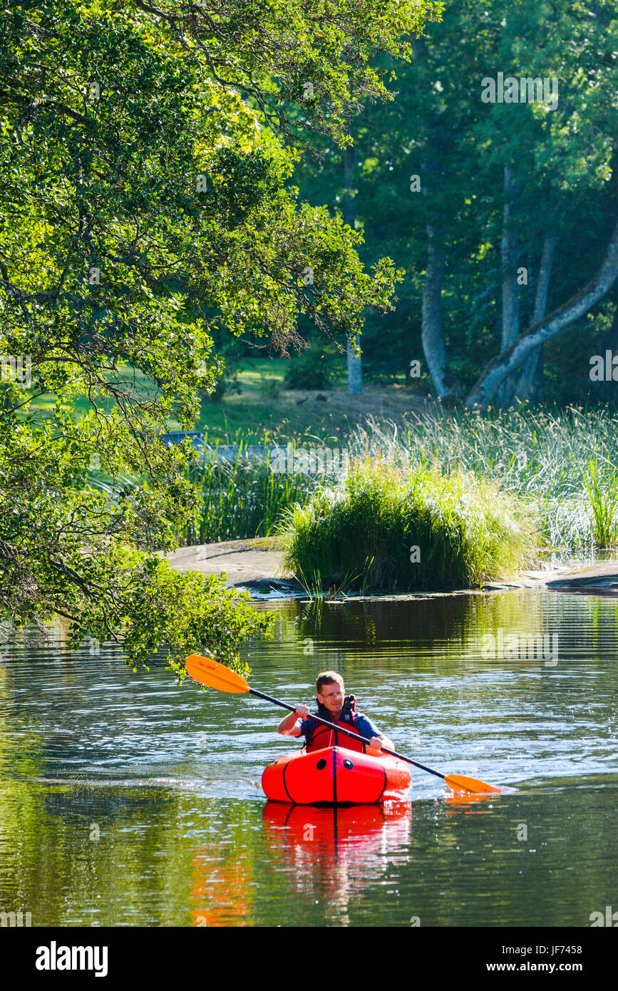 Man rafting on river Stock Photo - Alamy