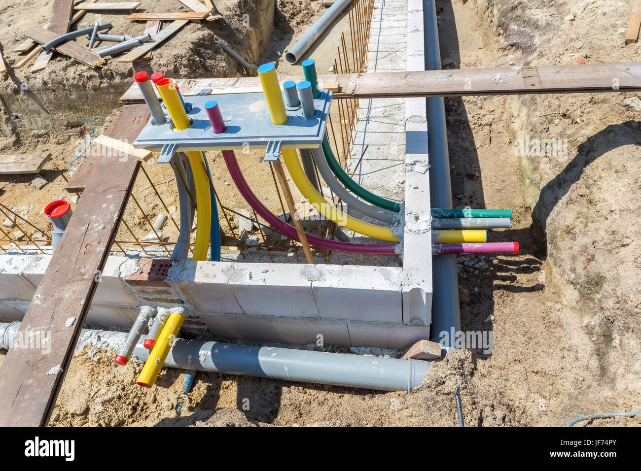 Foundation with pipes on building site Stock Photo - Alamy