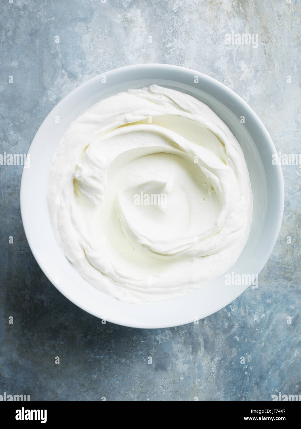 Bowl of cream Stock Photo - Alamy