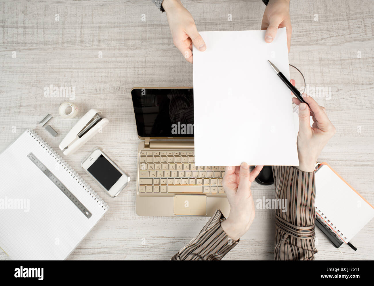Man in office signing contract hi-res stock photography and images - Alamy