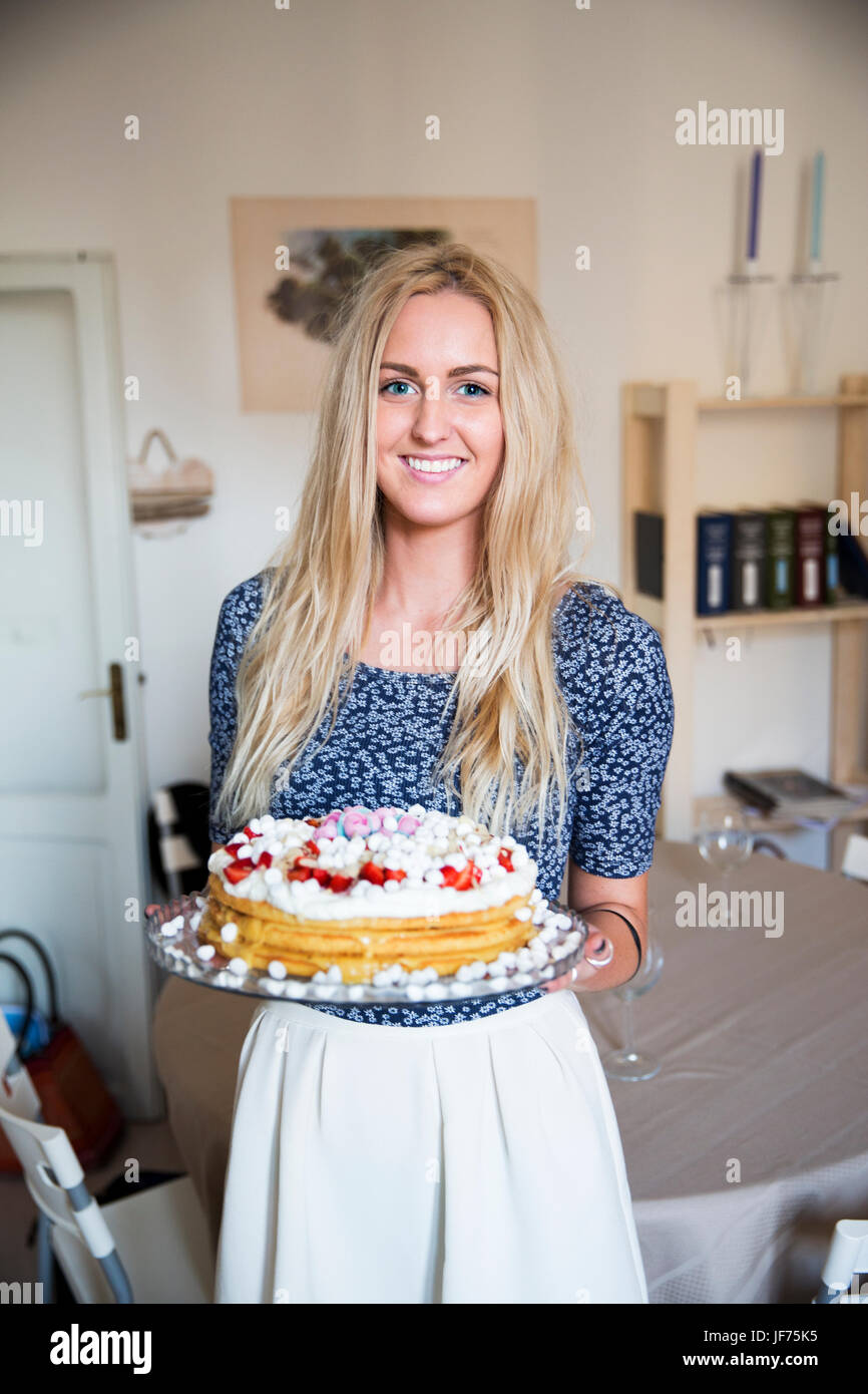 Woman holding cake hi-res stock photography and images - Alamy