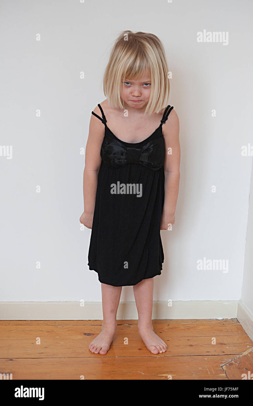 Portrait of cute frustrated girl Stock Photo - Alamy