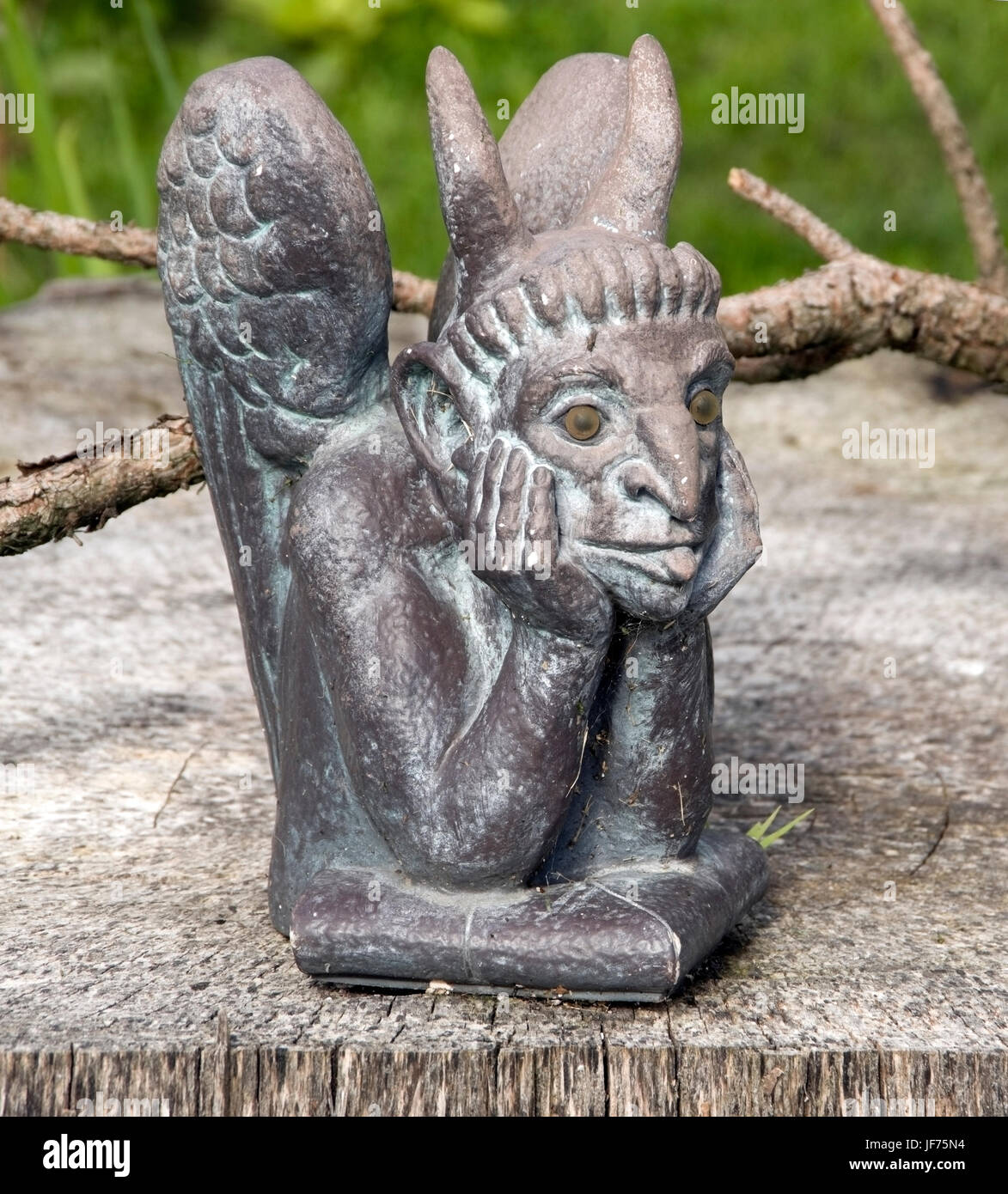 Miniature copy of Spitting Gargoyle of Notre Dame Cathedral Stock Photo ...