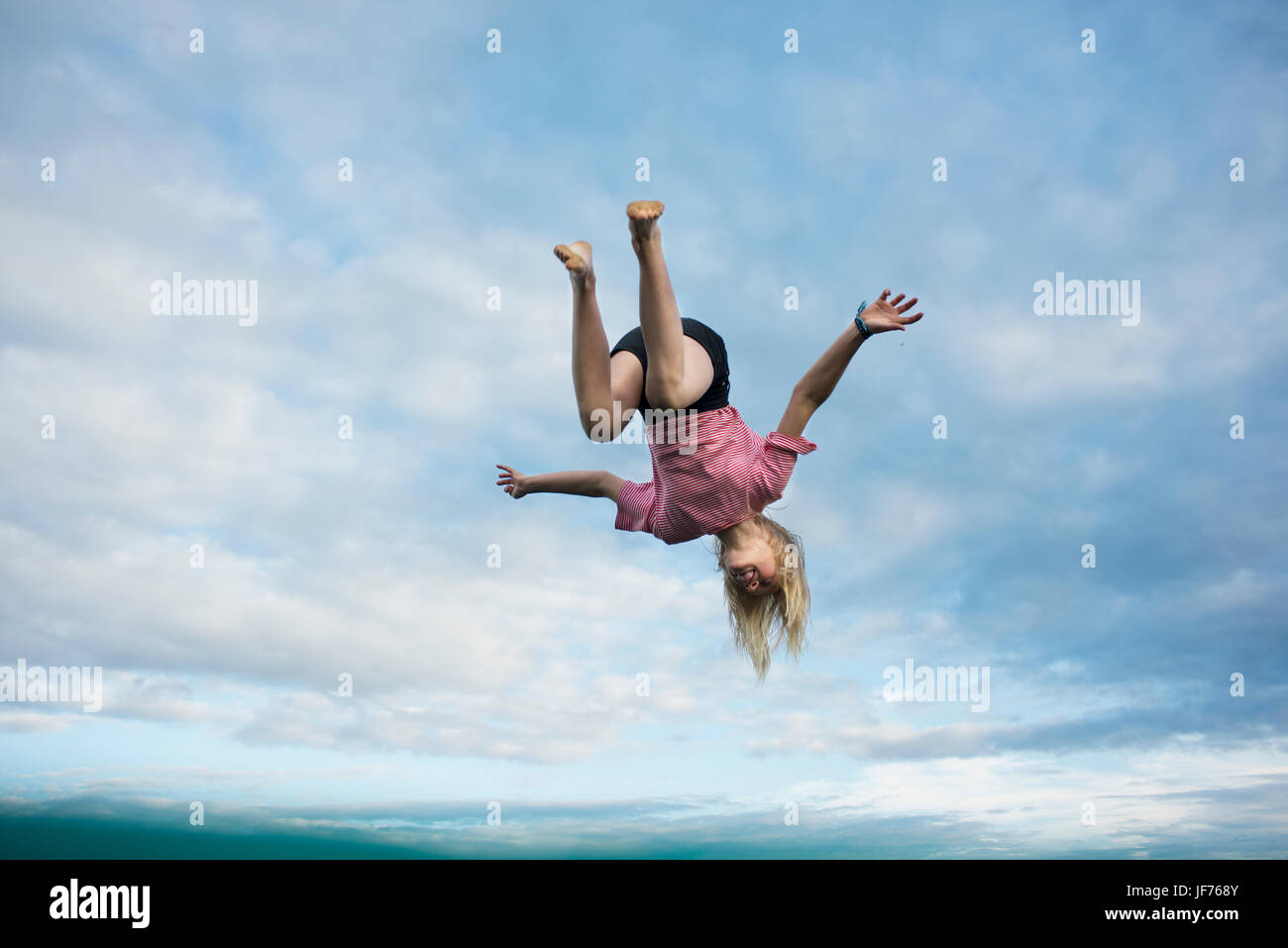 Jumping trampoline sky hi-res stock photography and images - Alamy