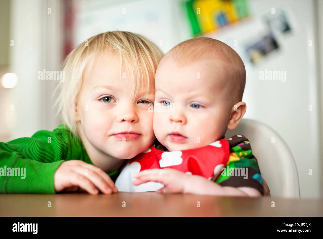 Boy with little brother Stock Photo - Alamy