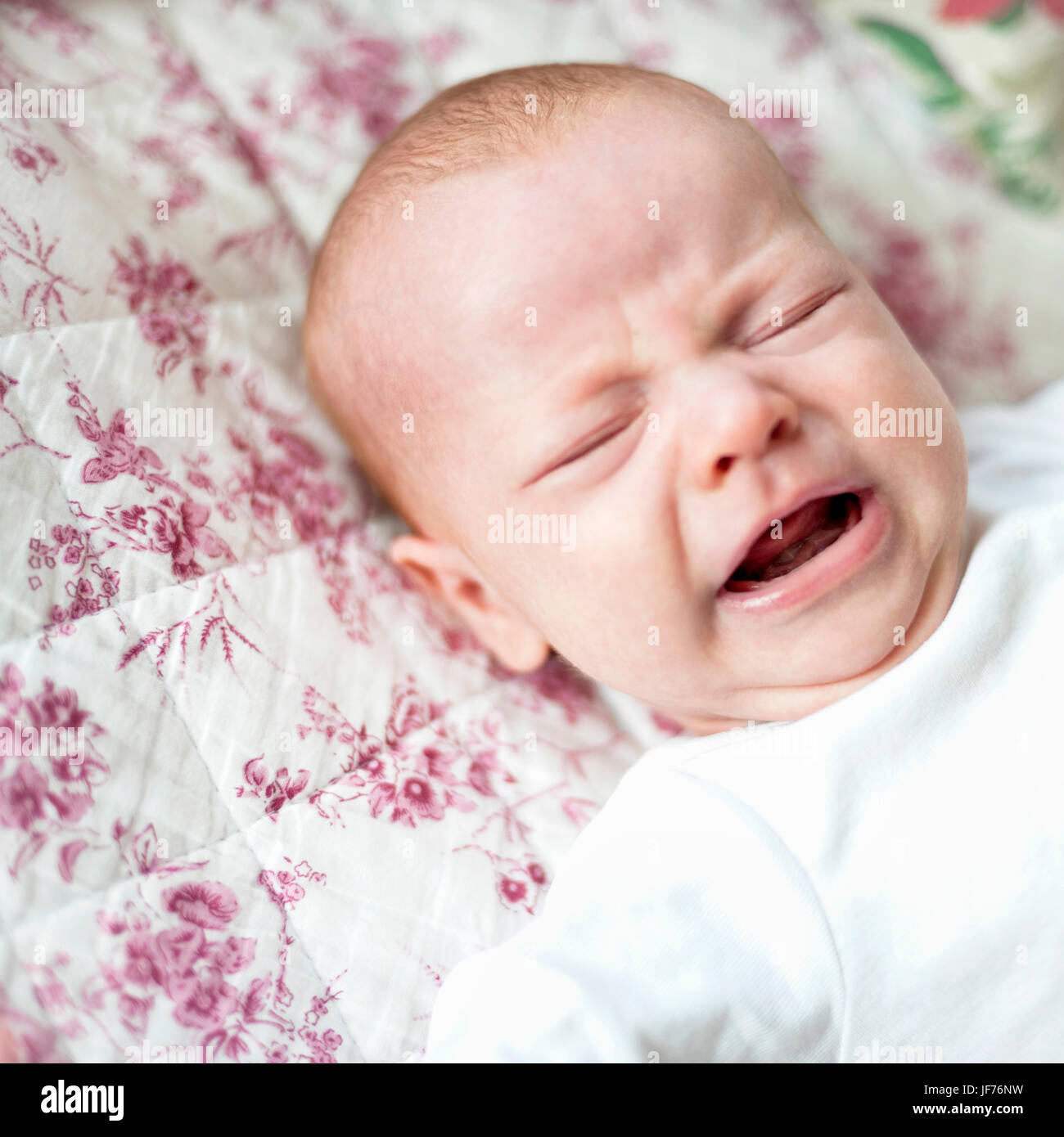 Close-up of crying baby Stock Photo - Alamy