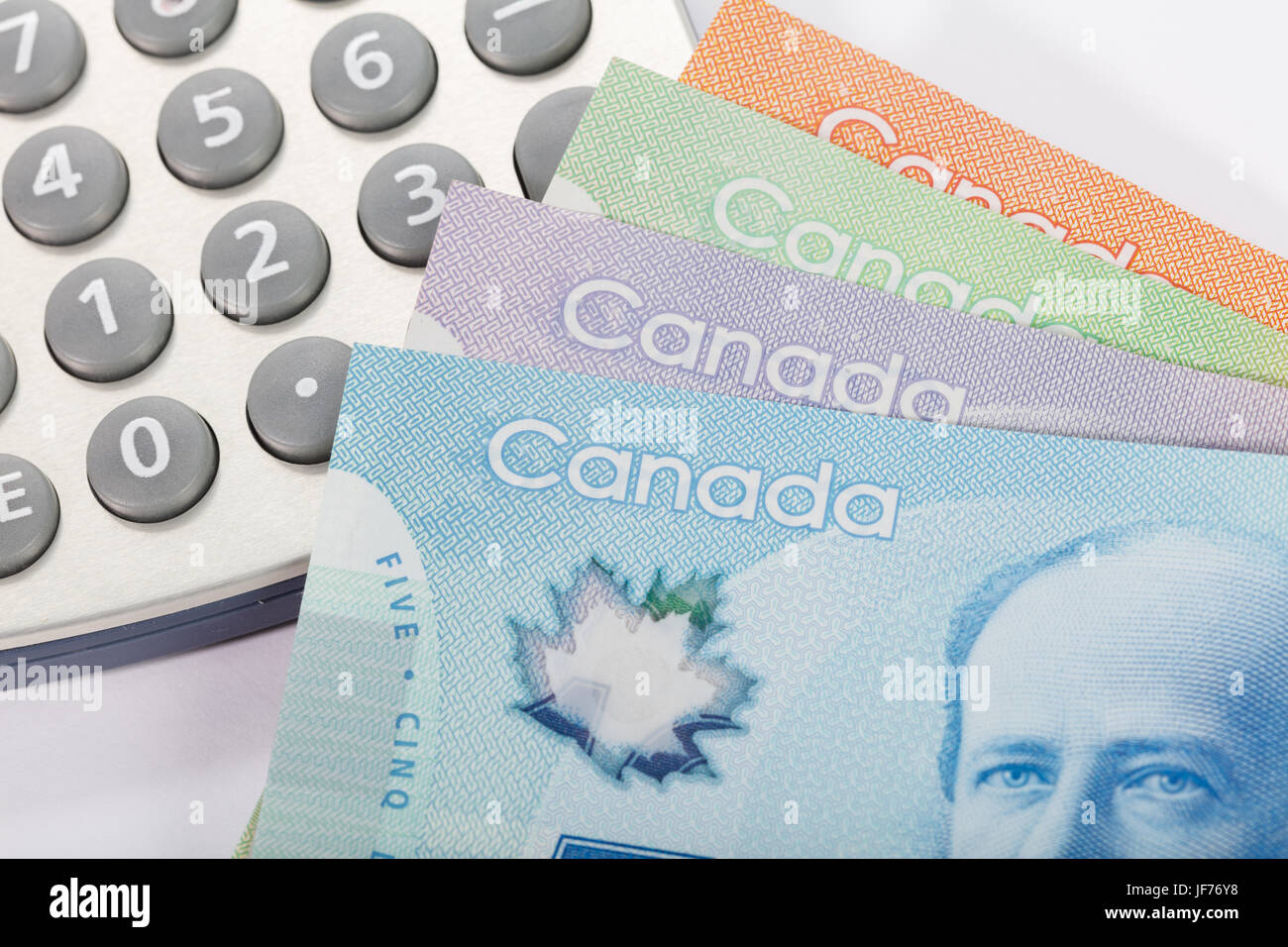 Canadian Dollar And Calculator Concept Of Business And Finance Stock