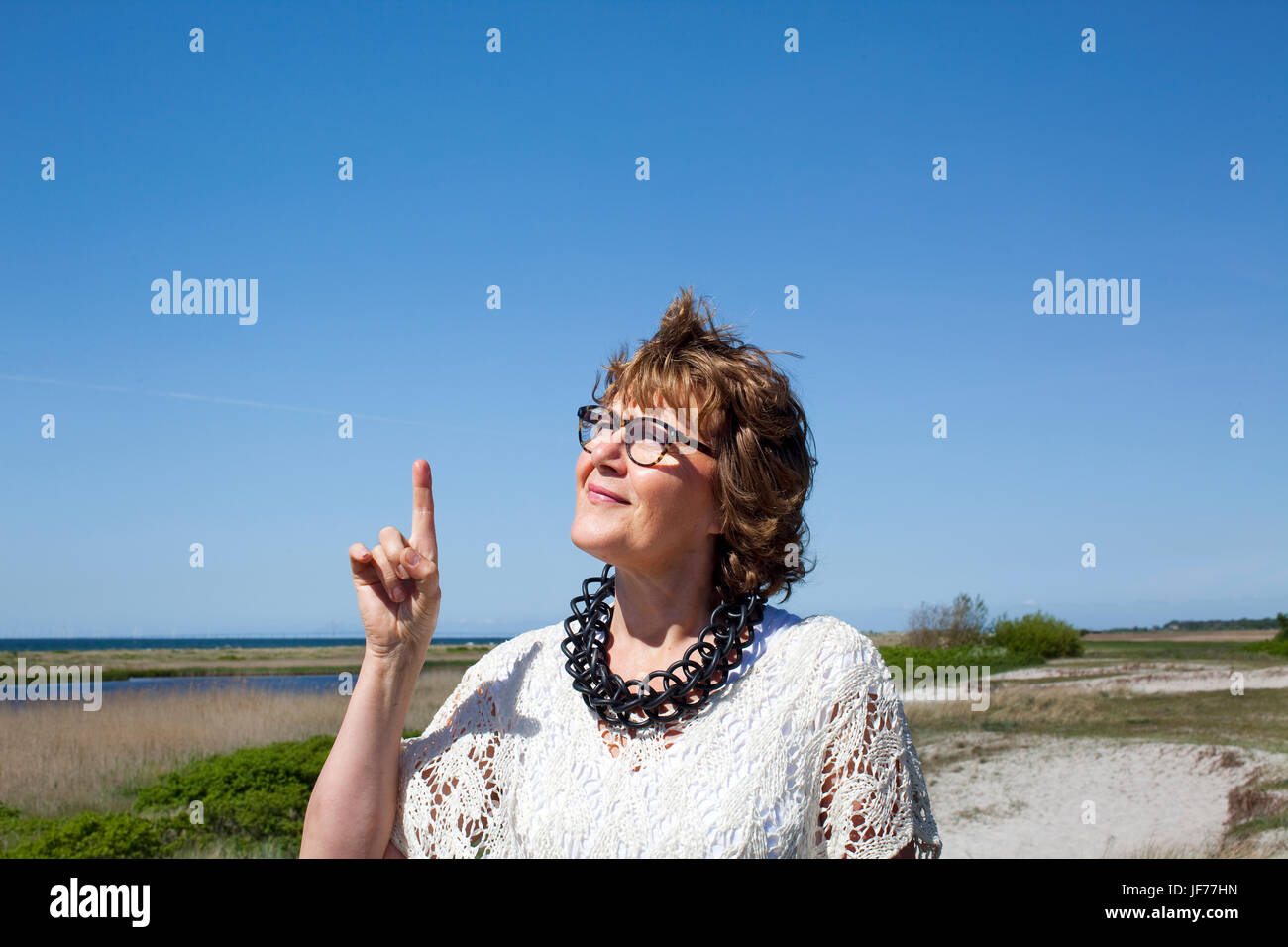 Checking wind finger hi-res stock photography and images - Alamy