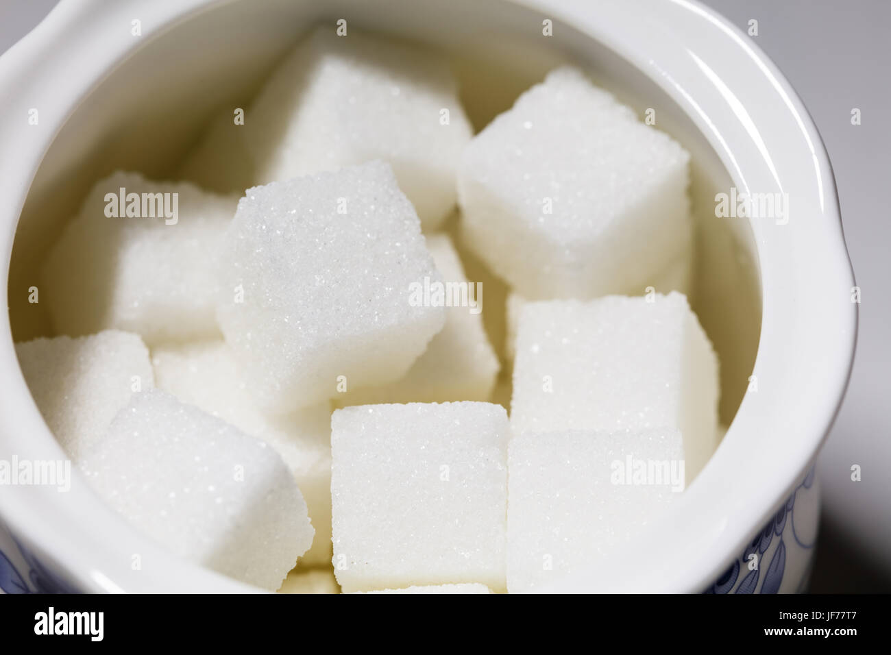 white sugar cubes close up, food concept Stock Photo - Alamy