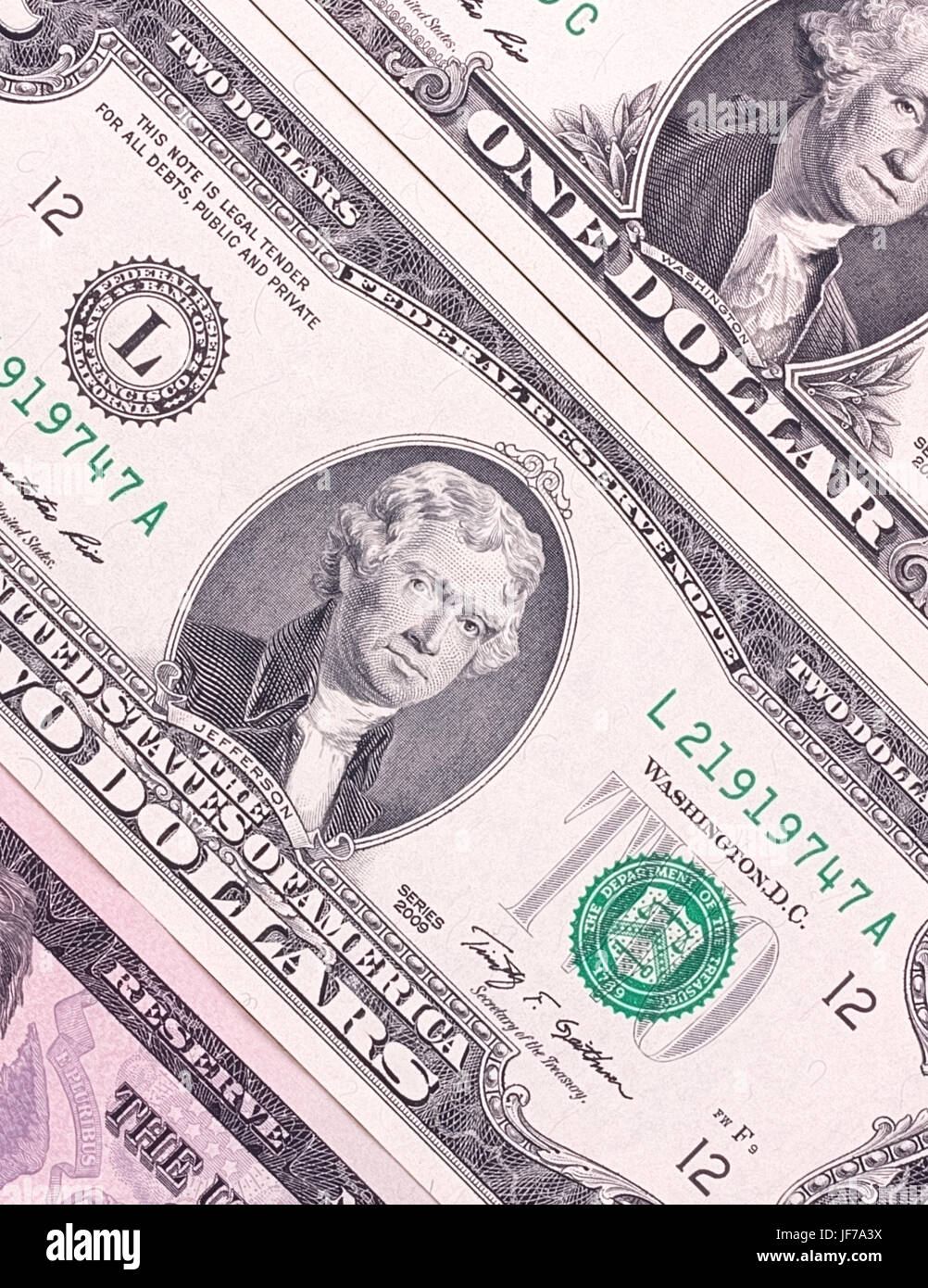 Abstract dollar bills of different denominations background Stock Photo ...