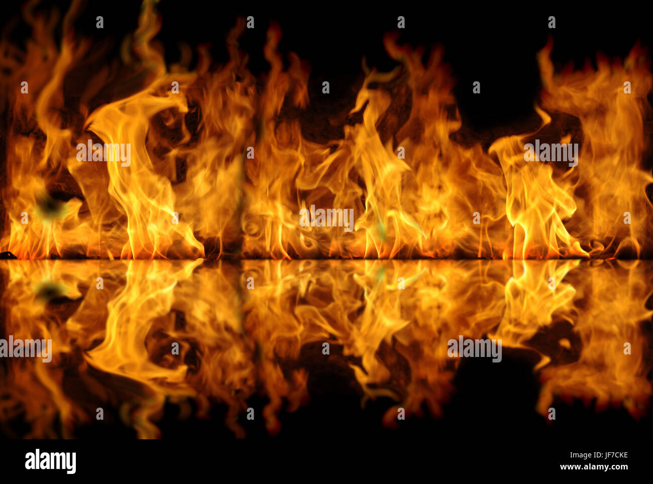 great fire and its reflection Stock Photo - Alamy