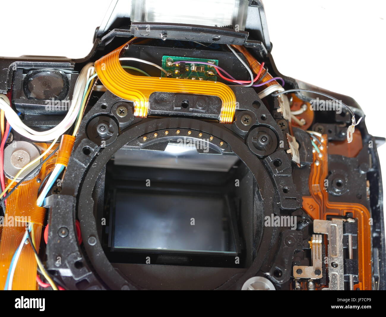 open camera prepared for repair on white background Stock Photo - Alamy