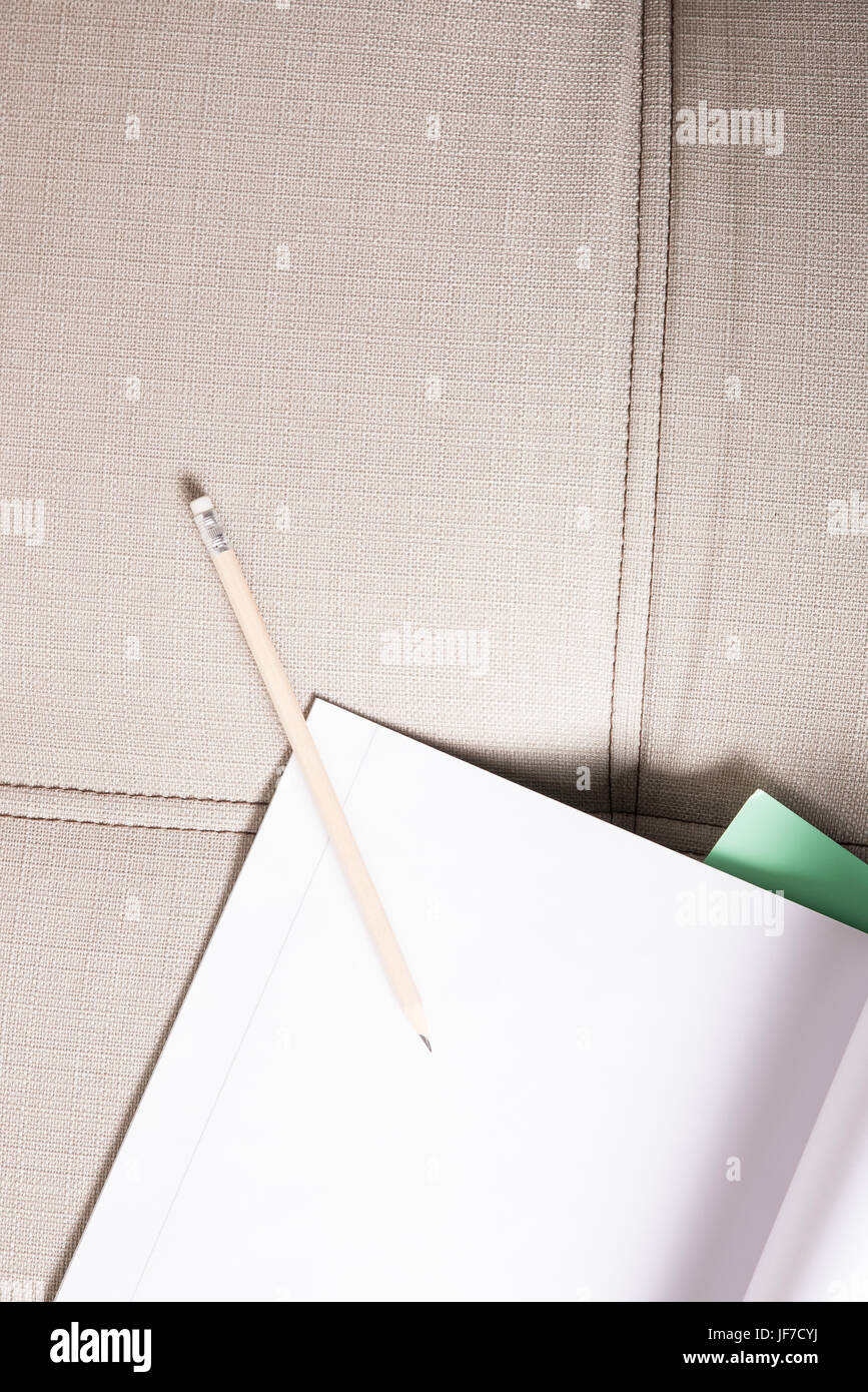 Taking notes on the Sofa Stock Photo - Alamy