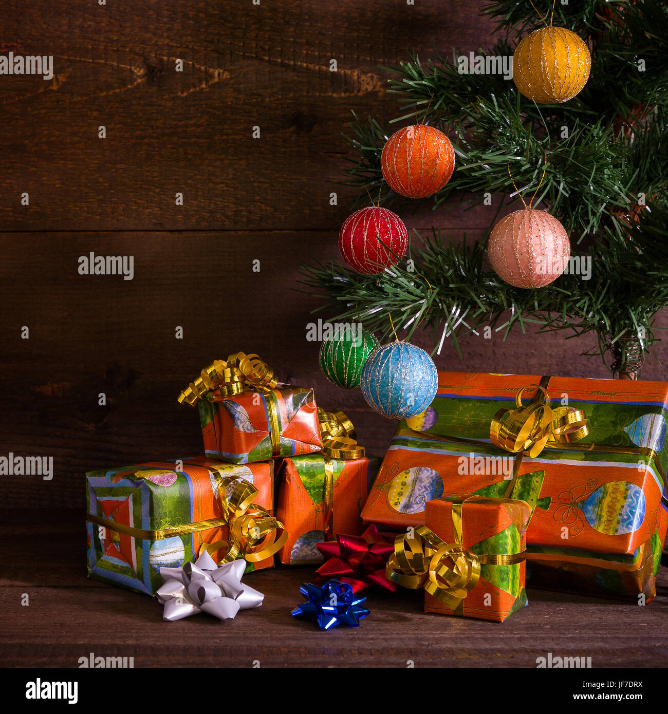 Many Christmas presents under the tree Stock Photo - Alamy