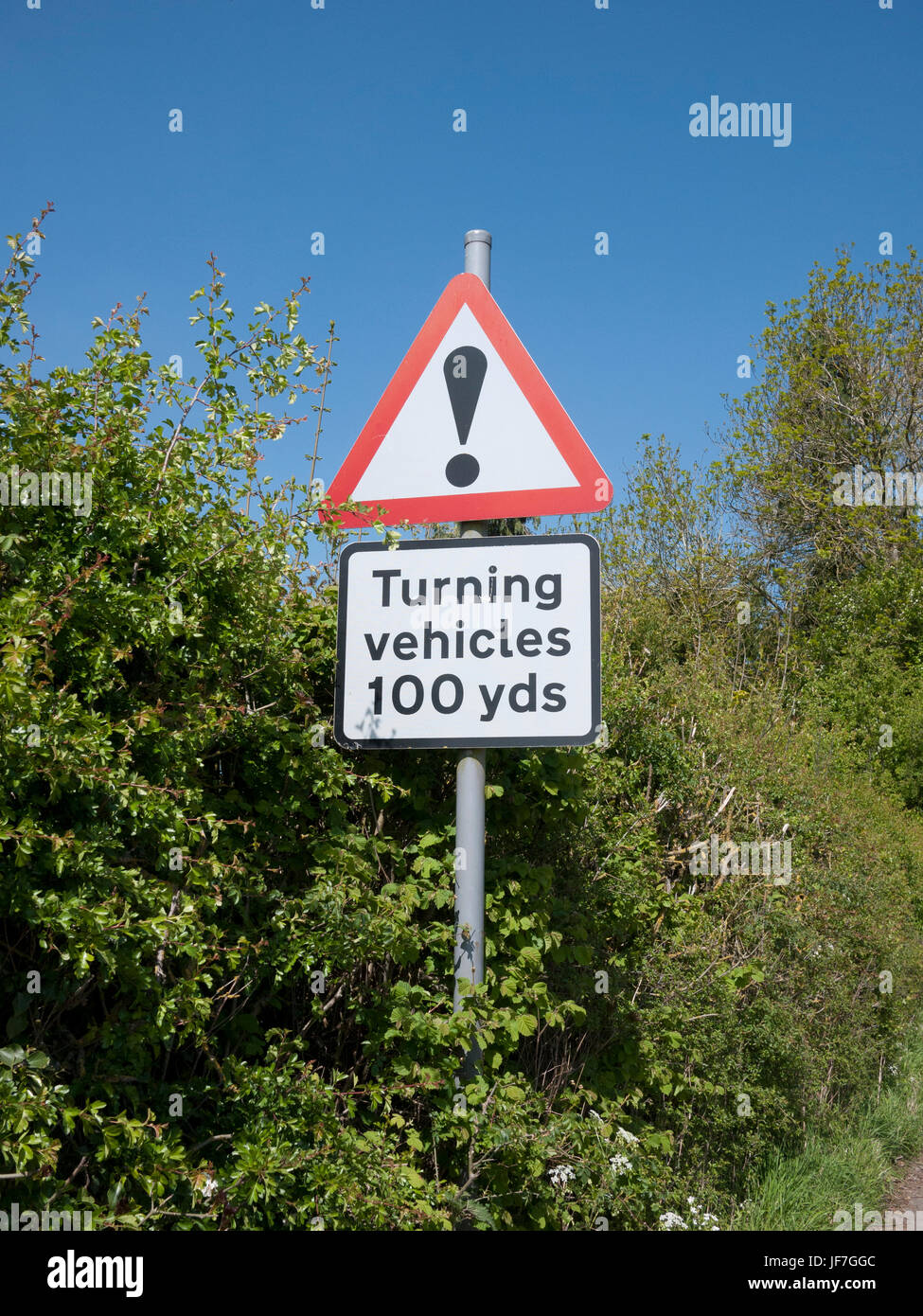 Vehicle Turning warning sign, England, UK Stock Photo - Alamy