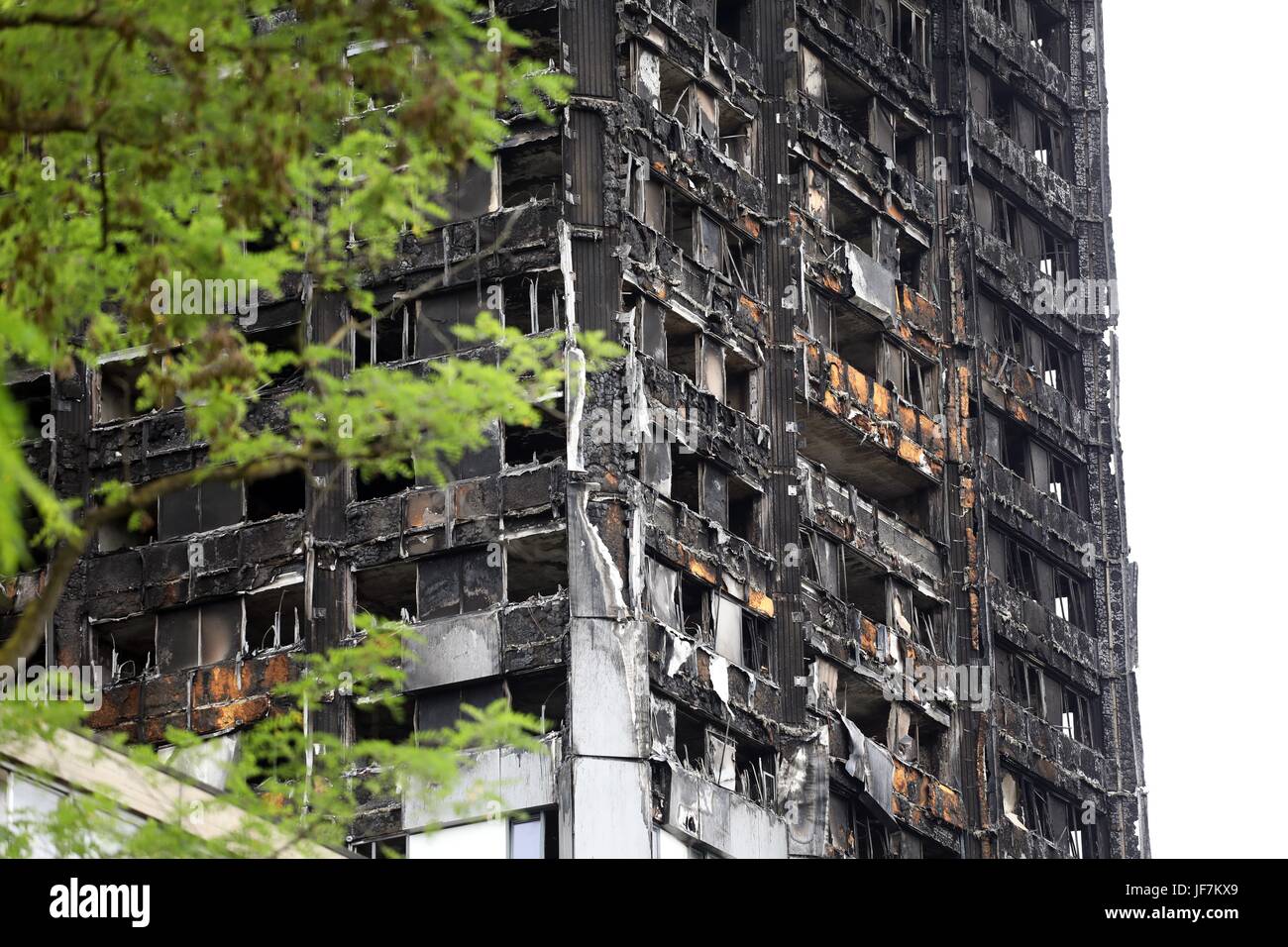 Grenfell Tower burnt out shell and tributes to the dead Stock Photo - Alamy