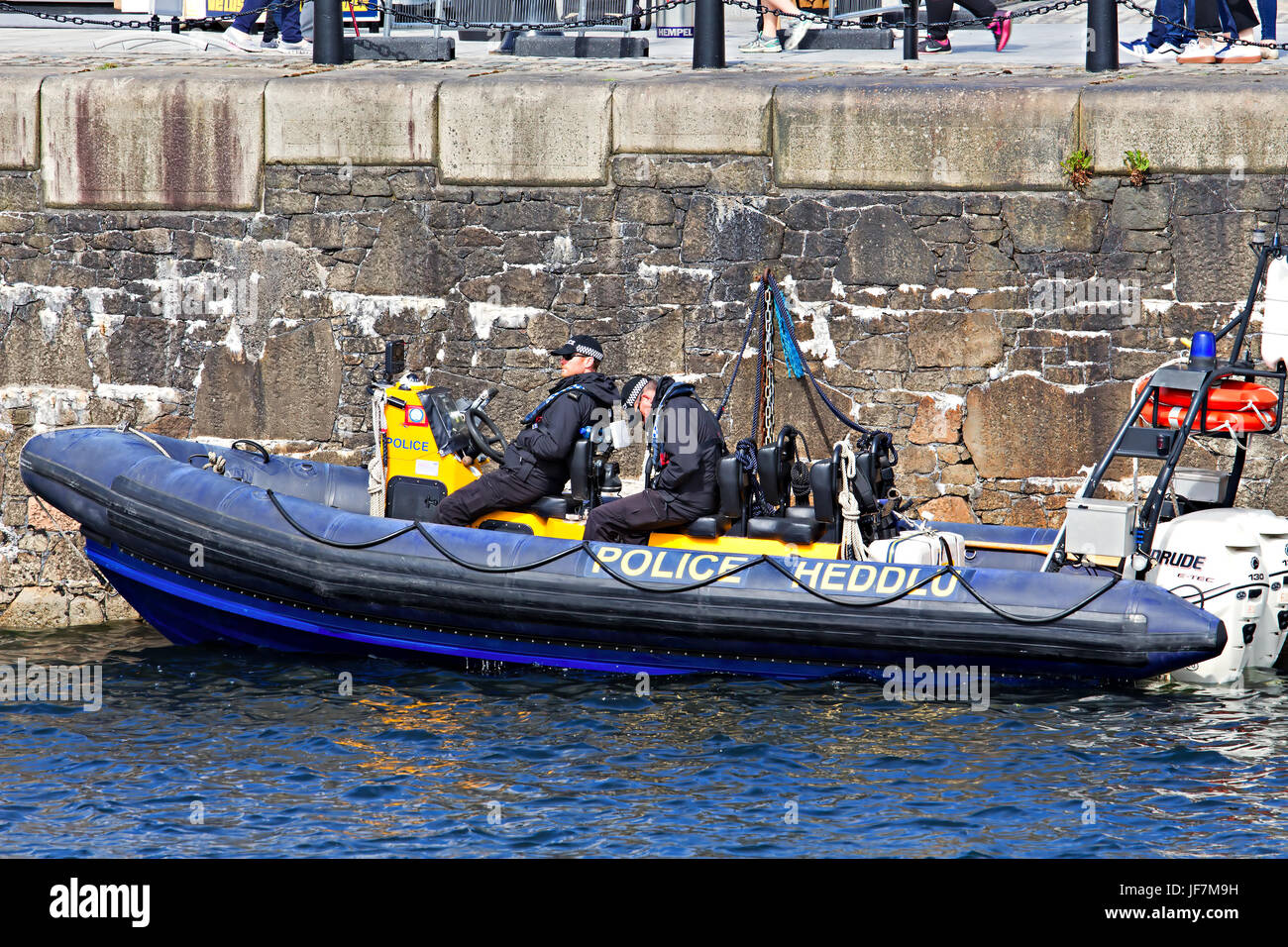 Uk River Police officers in an inflatable high speed boat Stock Photo ...