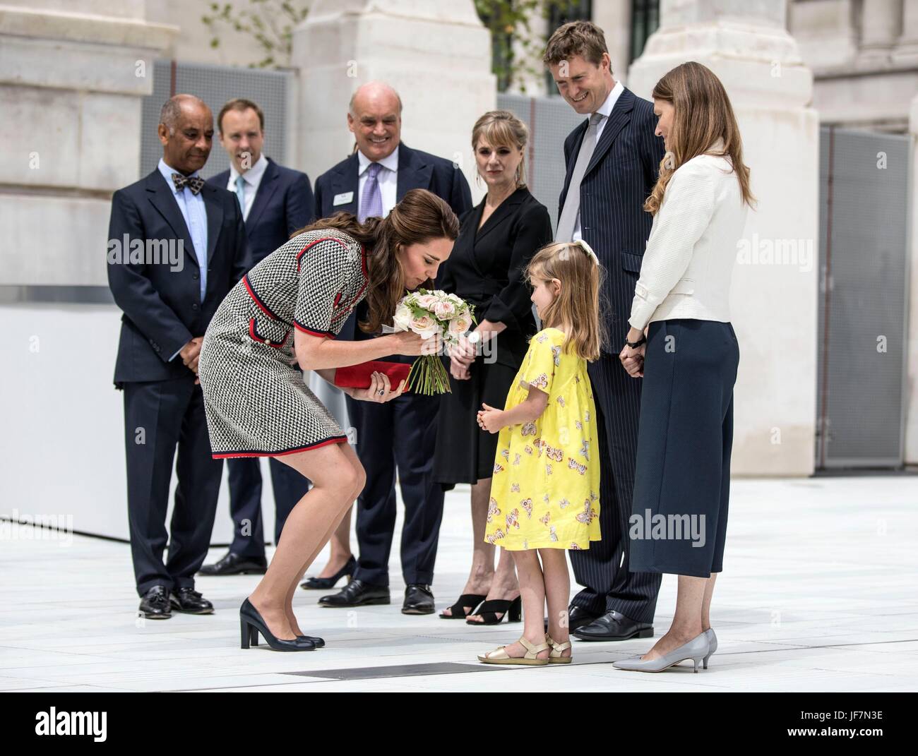 The Duchess of Cambridge receives flowers from six year old Lydia Hunt ...