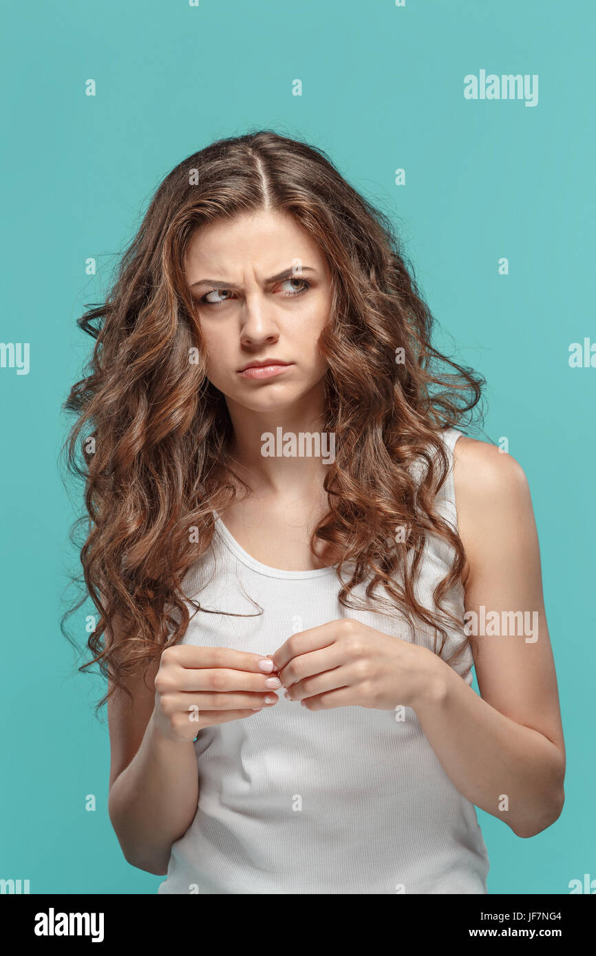 The portrait of disaffected woman on studio background Stock Photo - Alamy