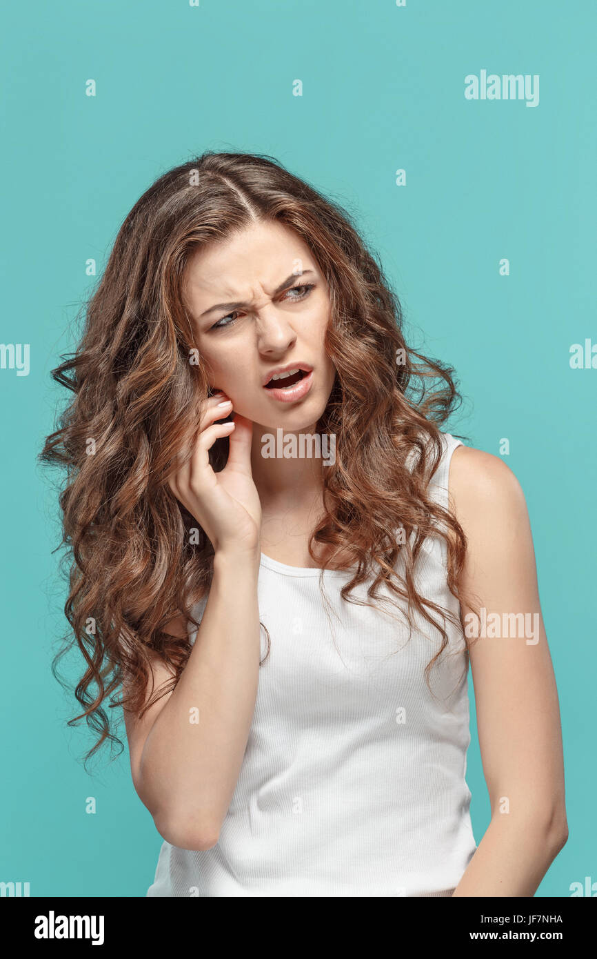 The portrait of disaffected woman on studio background Stock Photo - Alamy