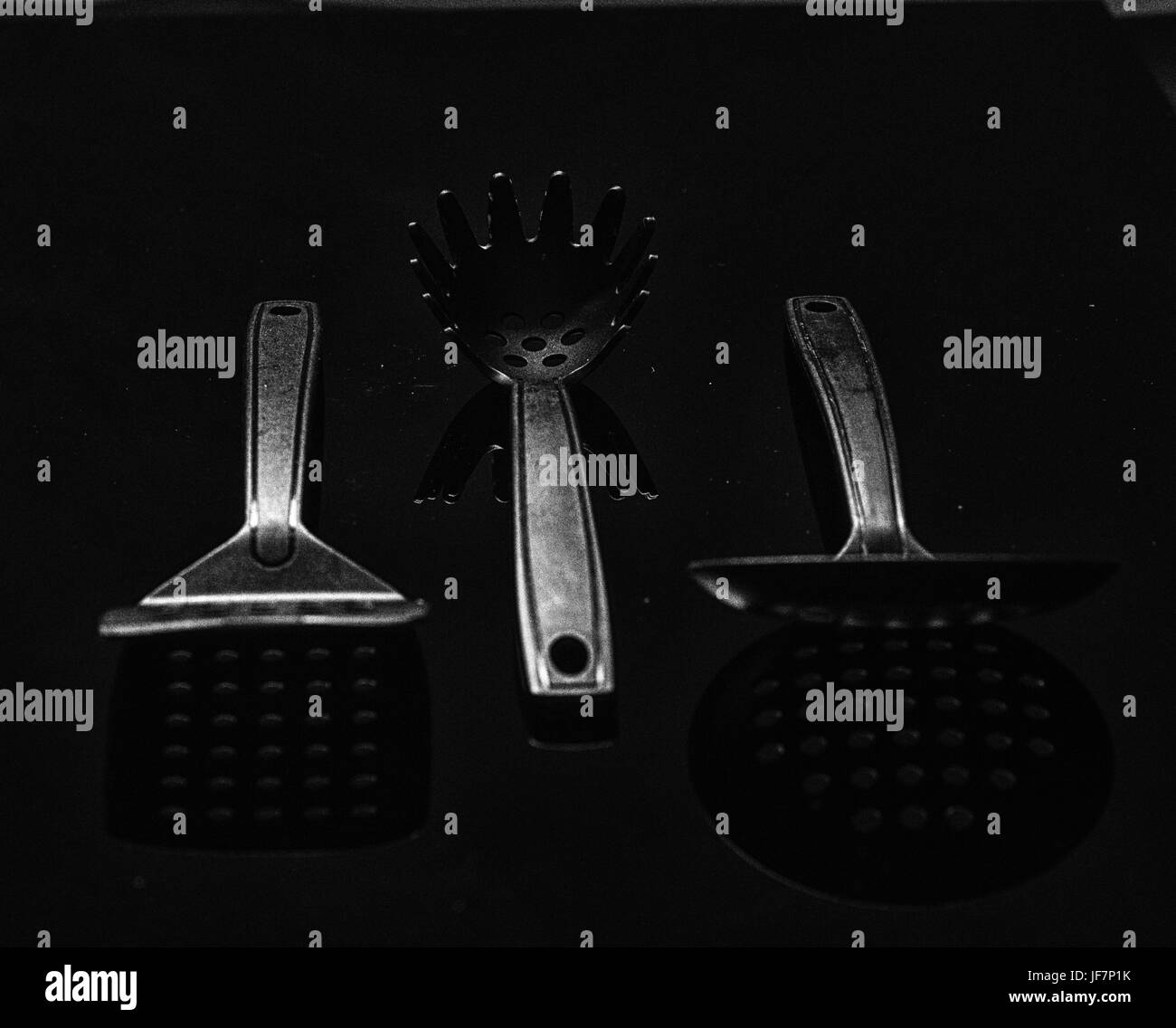Tools on black surface Black and White Stock Photos & Images - Alamy