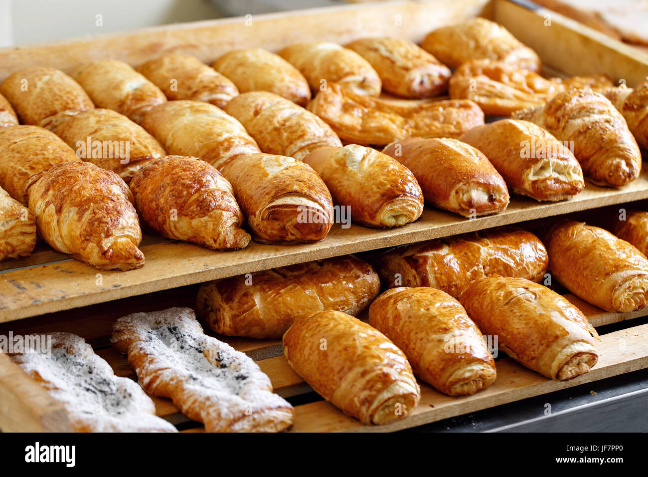 Puff pastry on wooden board. morning at the bakery Stock Photo - Alamy
