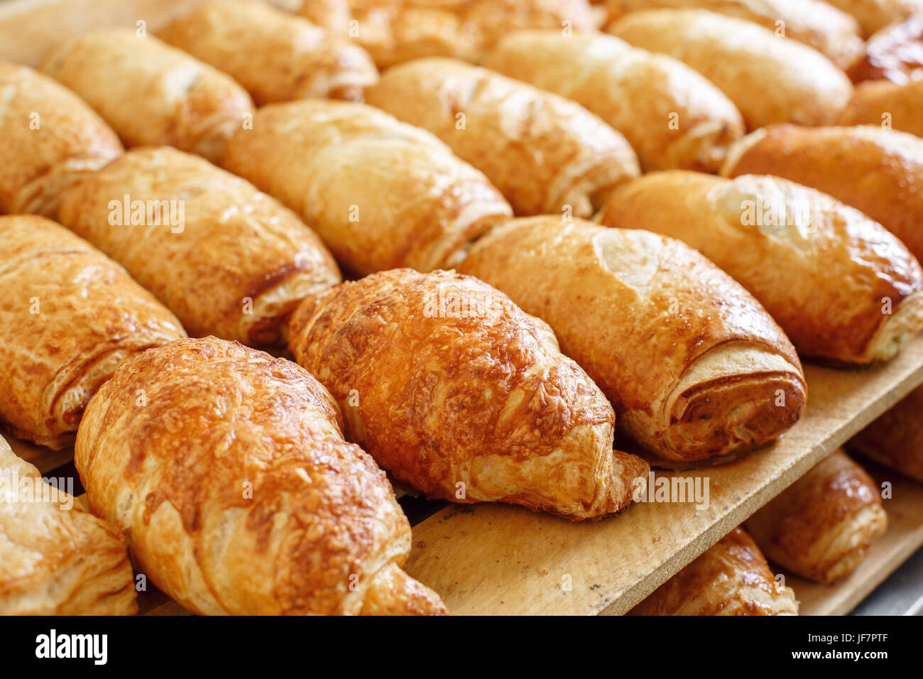 Puff pastry on wooden board. morning at the bakery Stock Photo - Alamy