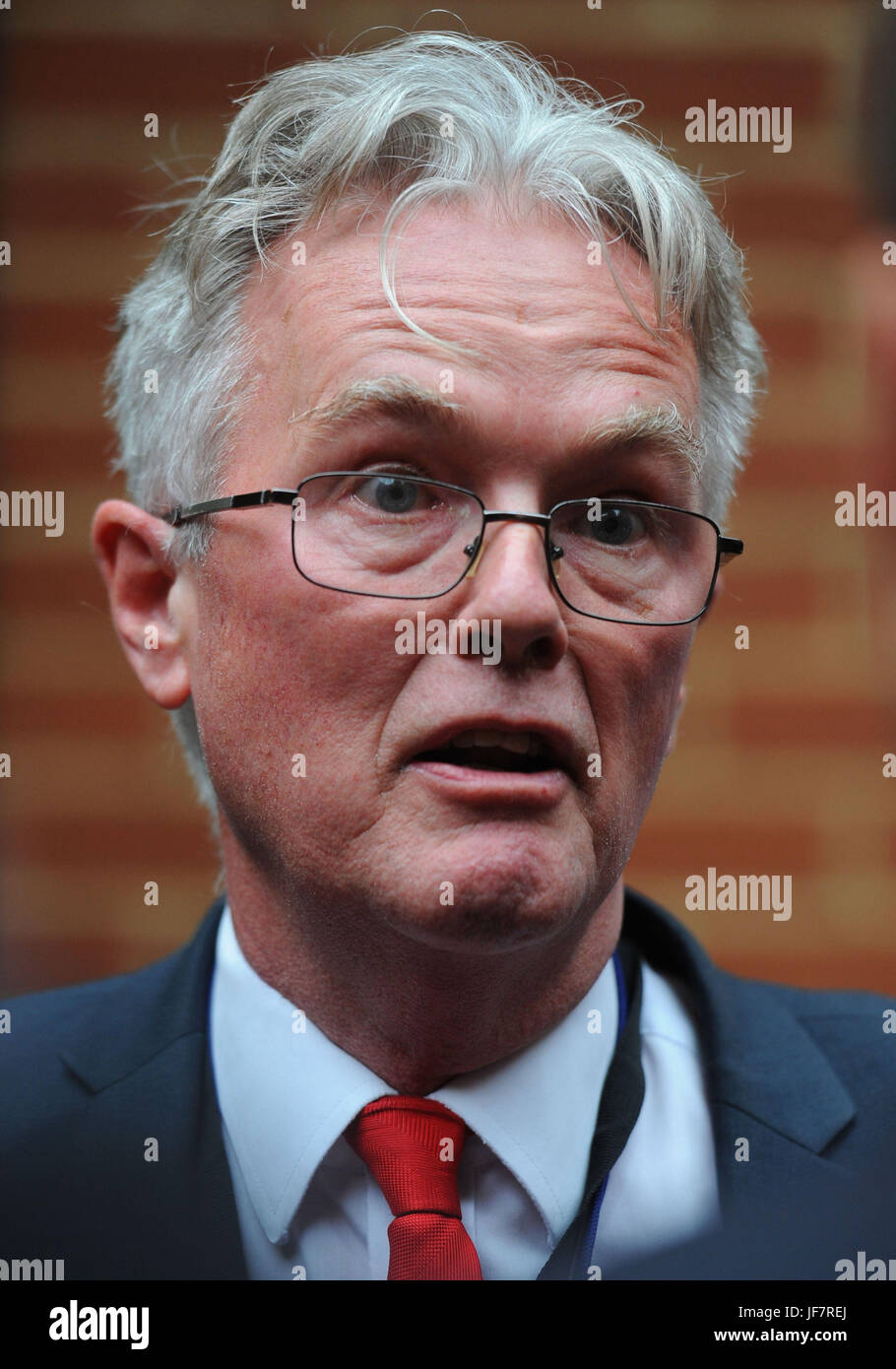Labour councillor Robert Atkinson speaks to the media outside ...