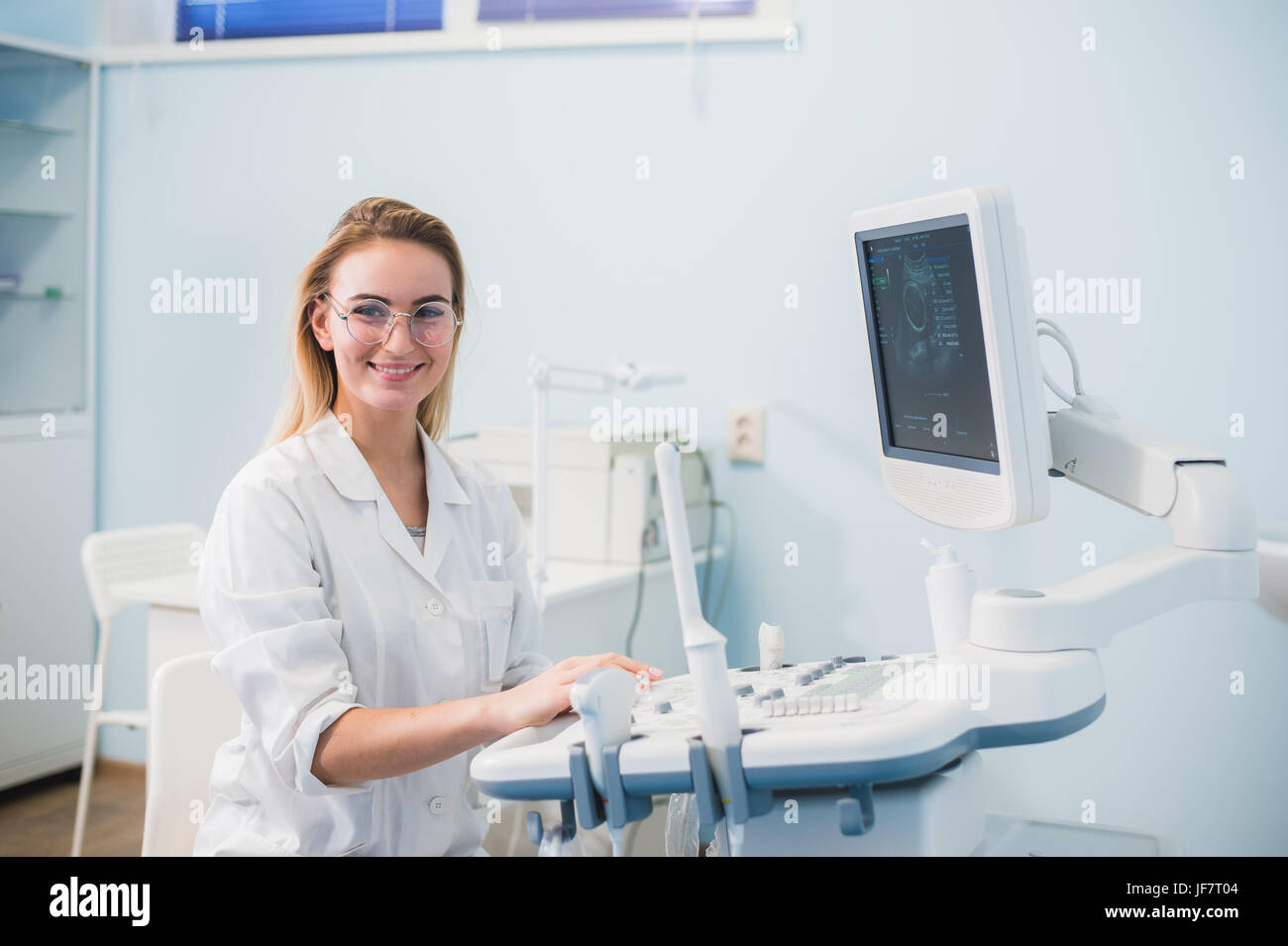 Ultrasound machine, doctor's hand usg investigation USCG Stock Photo ...