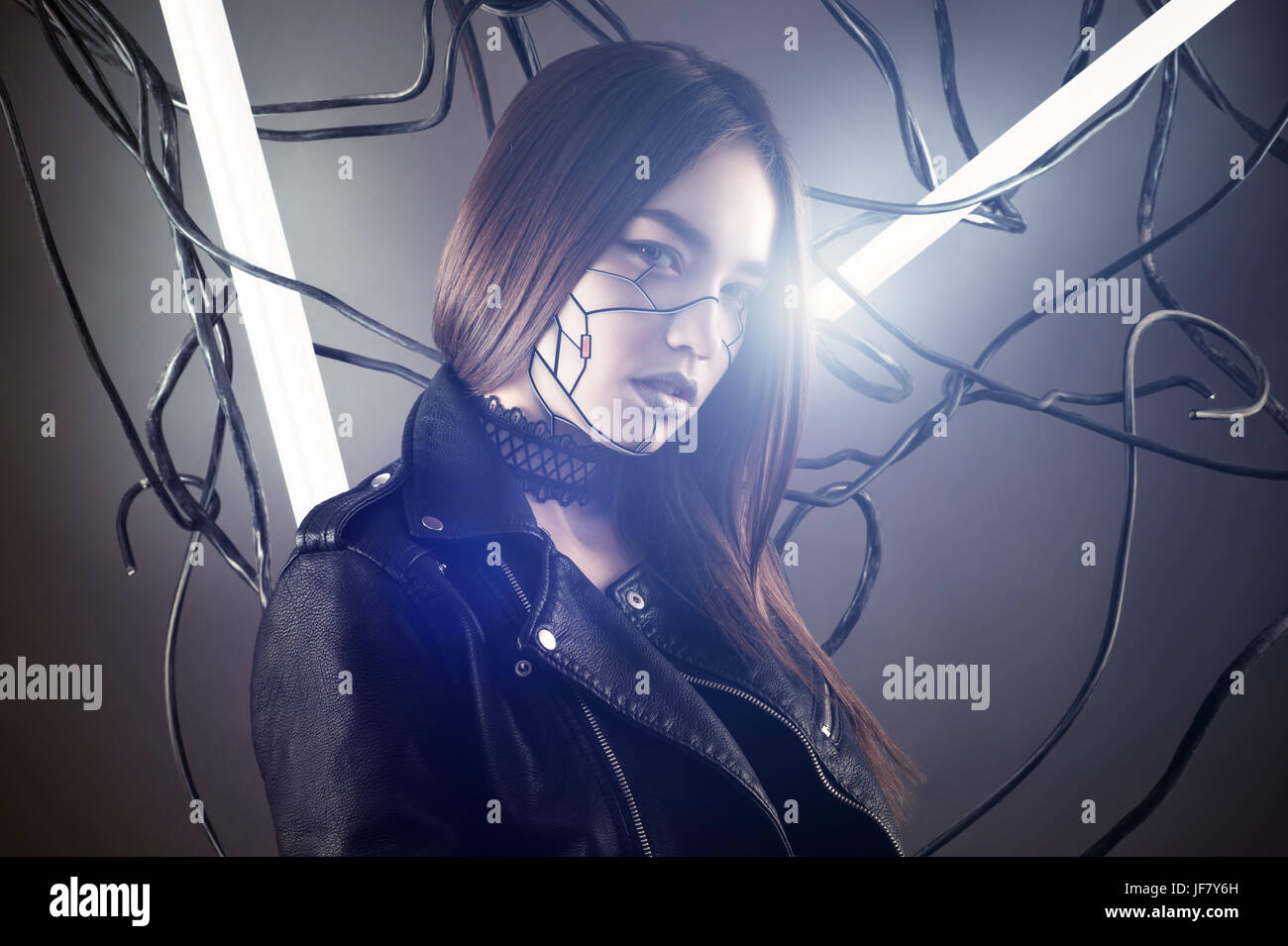 beautiful robot girl in cyberpunk style on background of wires and ...