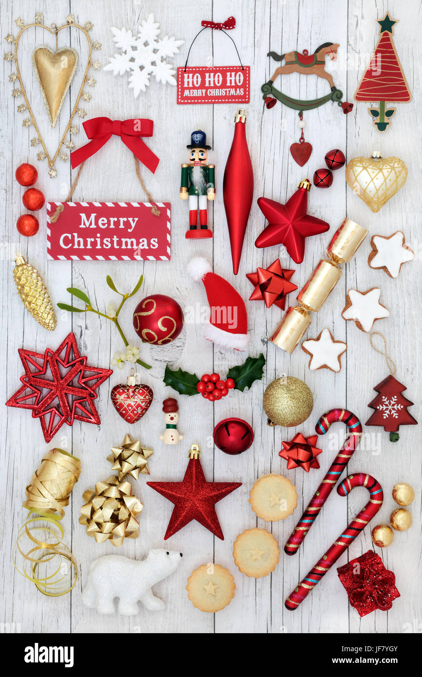 Symbols of christmas with bauble decorations, holly, mistletoe, mince ...