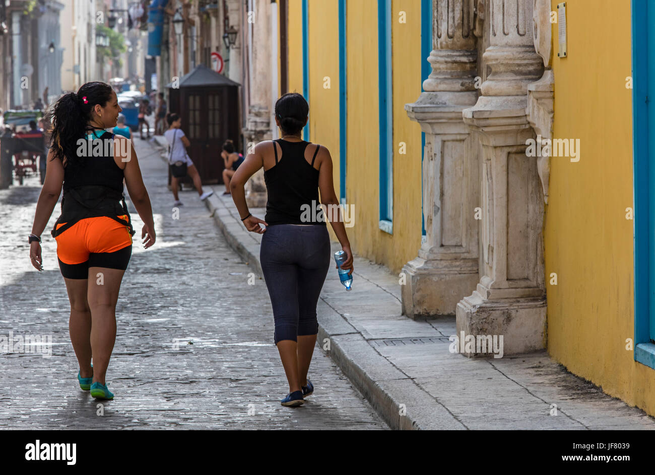 Cuban woman walking in HABANA VIEJA - HAVANA CUBA Stock Photo - Alamy