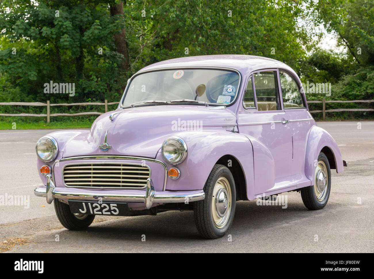Morris Minor 1000000 car called "Millie" in pink, parked in a car park ...