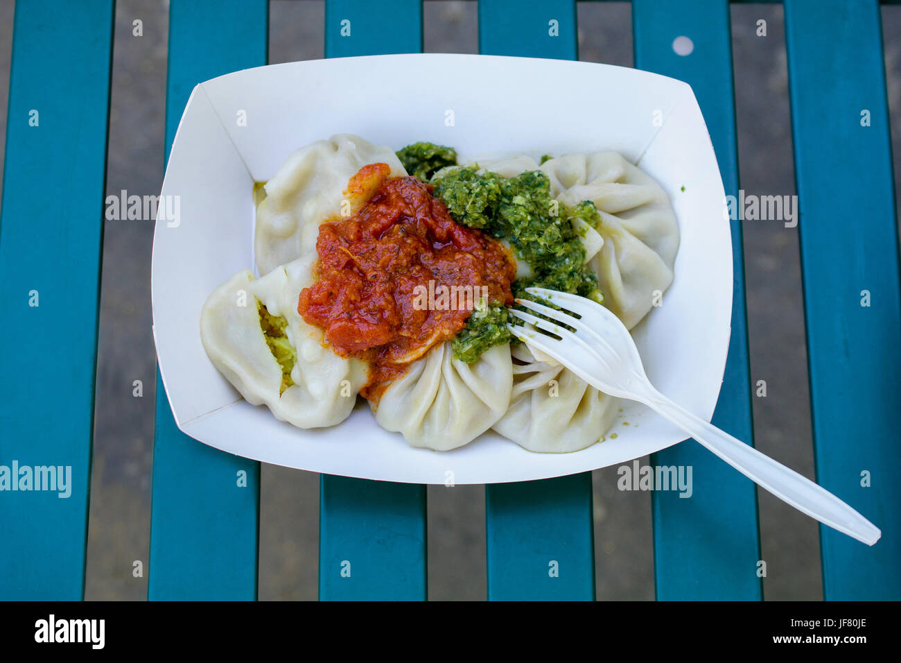 Closeup on Vegie indian momos - Steamed dumplings with tomato and ...