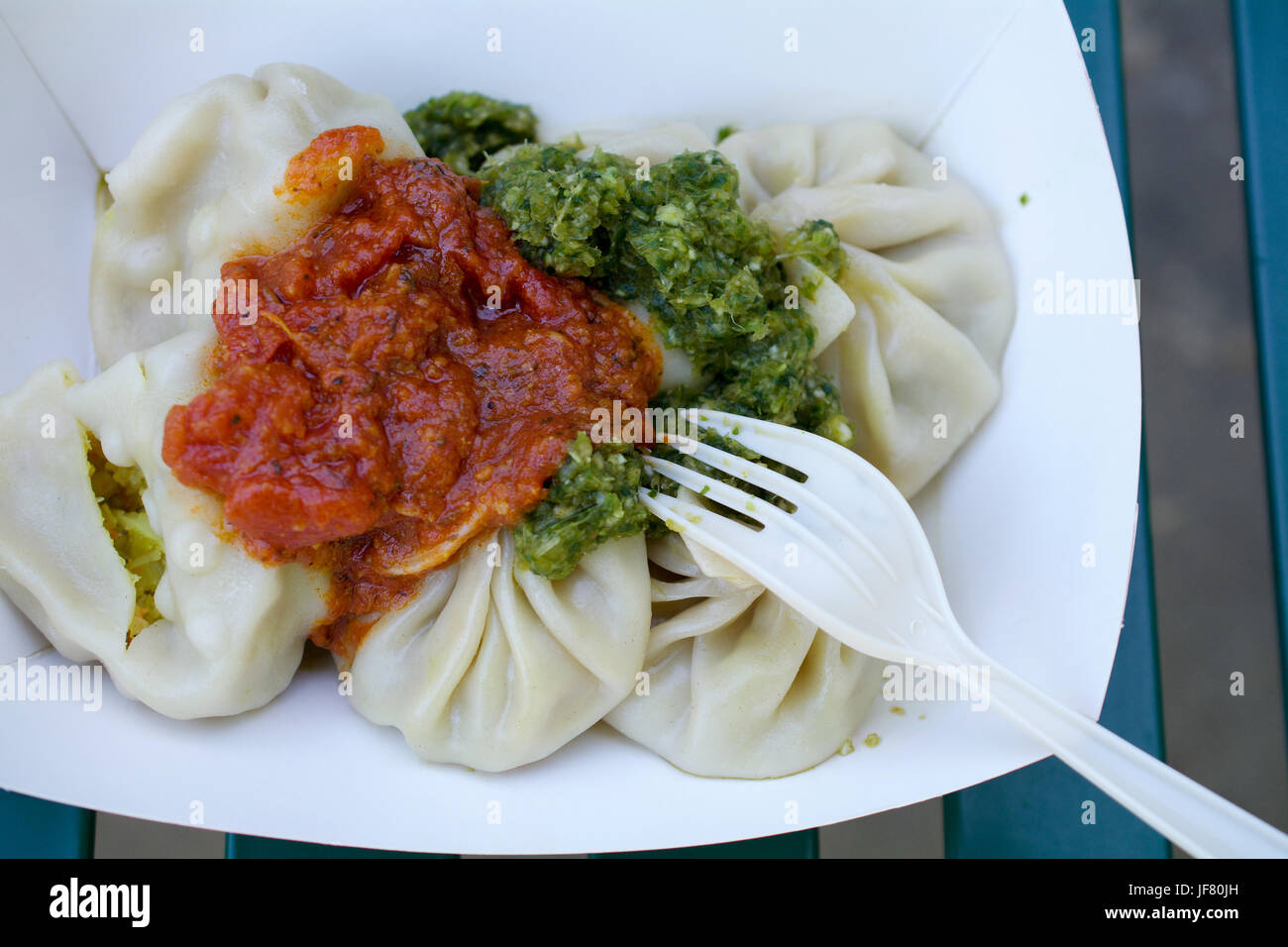 Closeup on Vegie indian momos - Steamed dumplings with tomato and ...