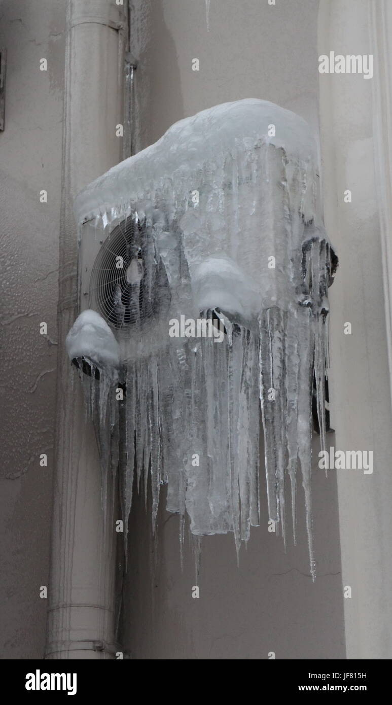Air conditioning frozen over as an icicle Stock Photo - Alamy