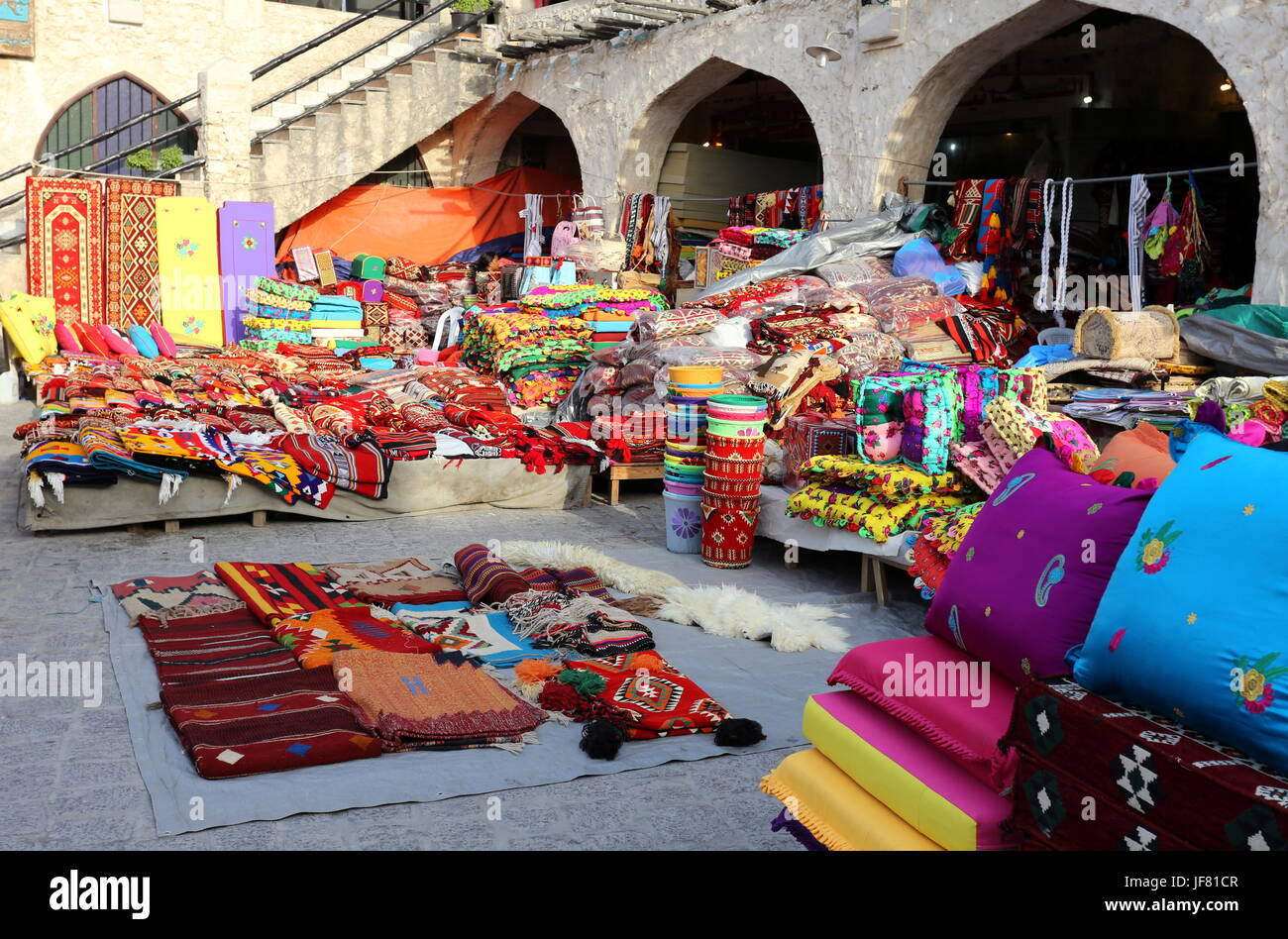 Colourful textiles on show at one of the shops in Souq Waqif market ...