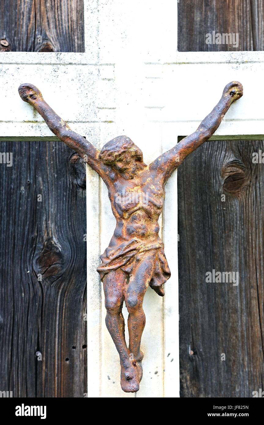 the in rust aged Christ on the cross Stock Photo - Alamy
