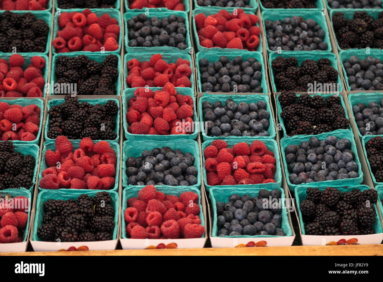 Baskets of organic berries Stock Photo - Alamy