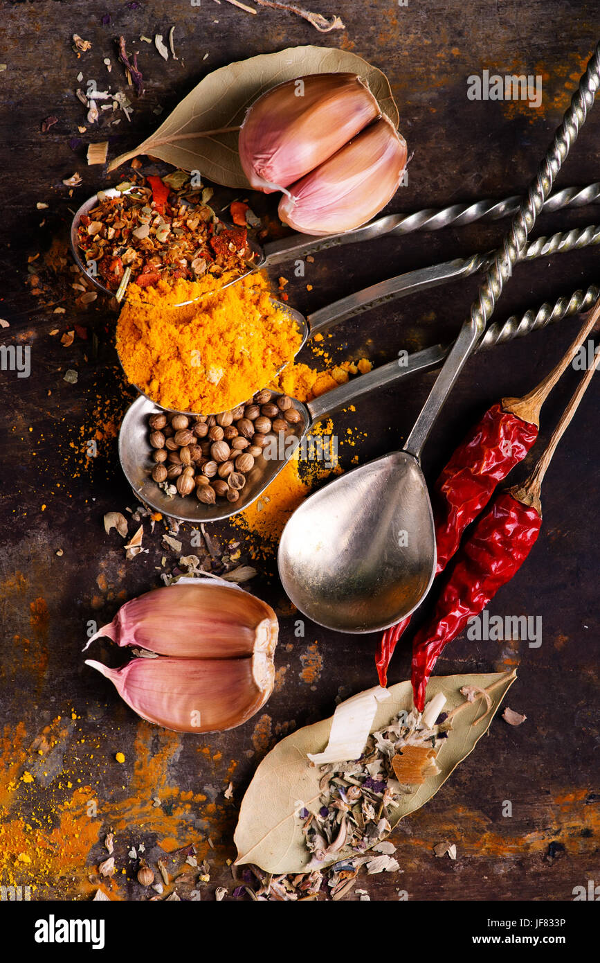 aroma spice in spoons and on a table Stock Photo - Alamy