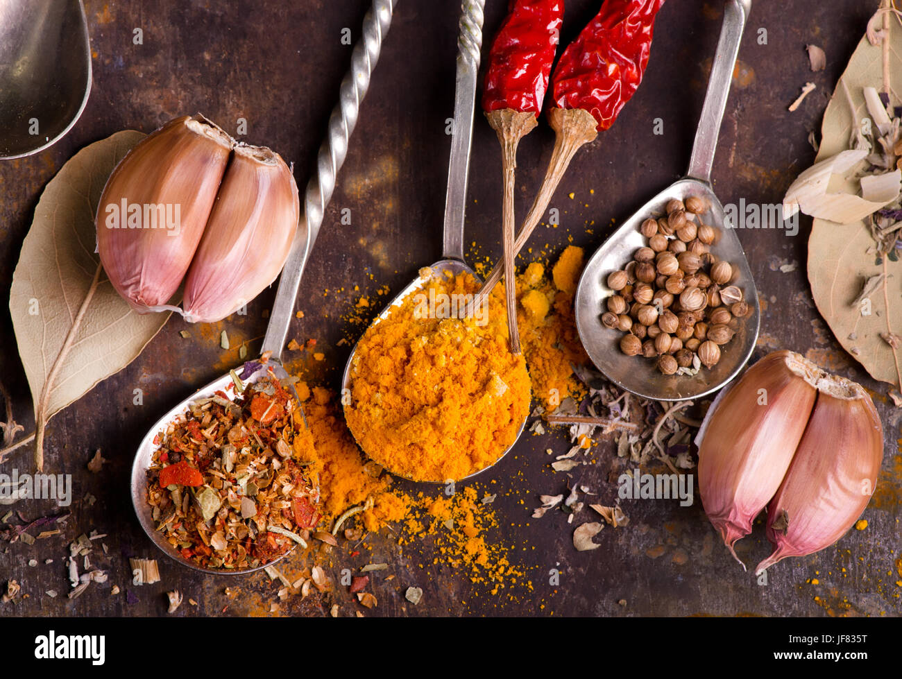 aroma spice in spoons and on a table Stock Photo - Alamy