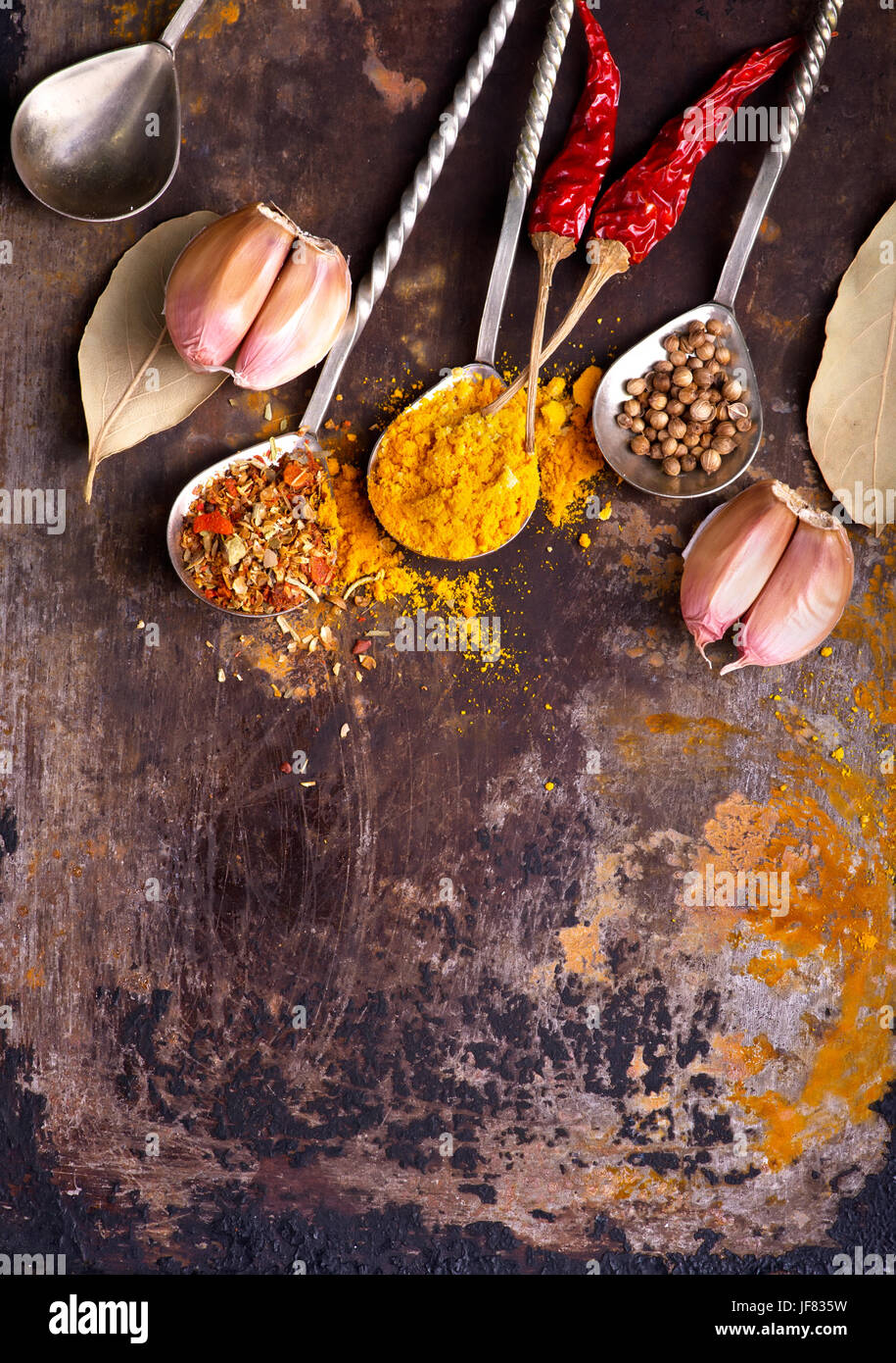 aroma spice in spoons and on a table Stock Photo - Alamy