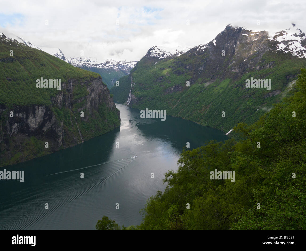 Looking down on Geirangerfjord from Eagle Road Viewpoint on a cloudy ...