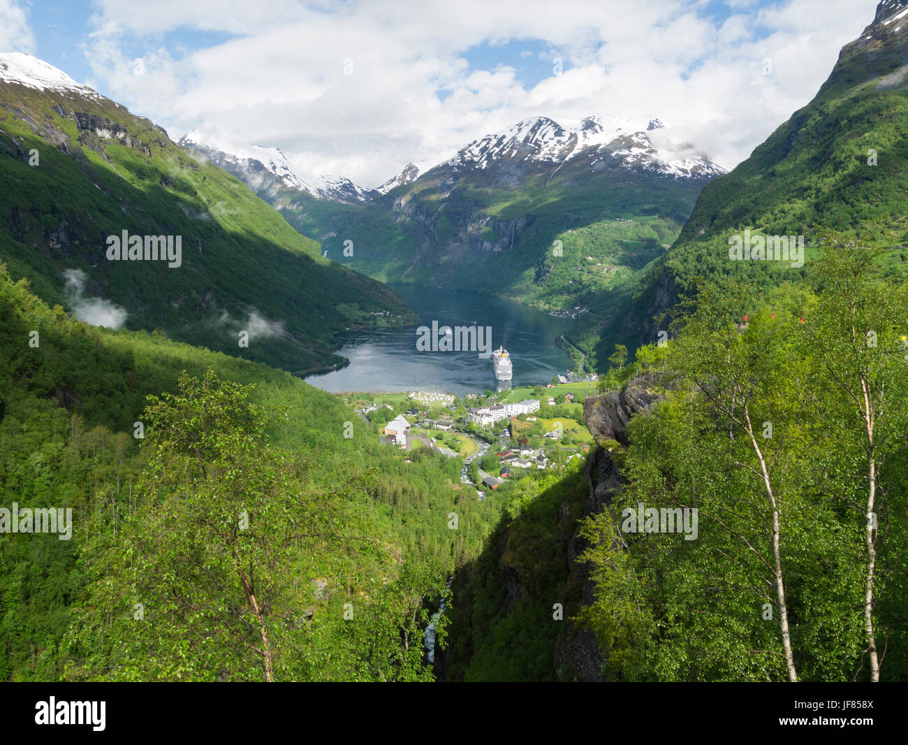 View down to Geiranger village and cruise ship in Geirangerfjord from ...