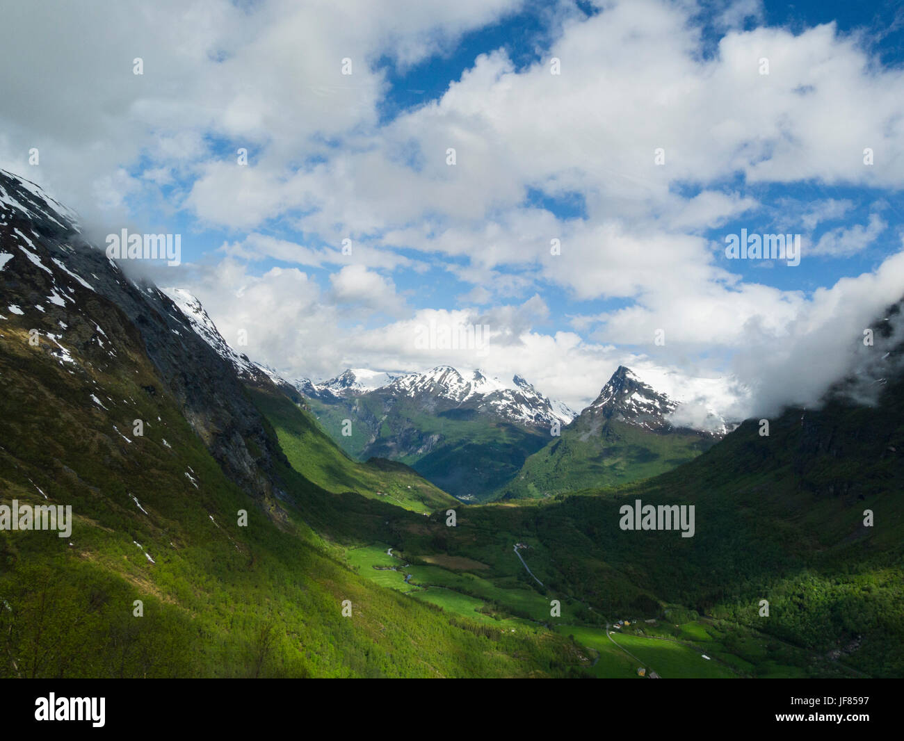 View up to snow capped Mount Dalsnibba along Geiranger valley Stranda ...