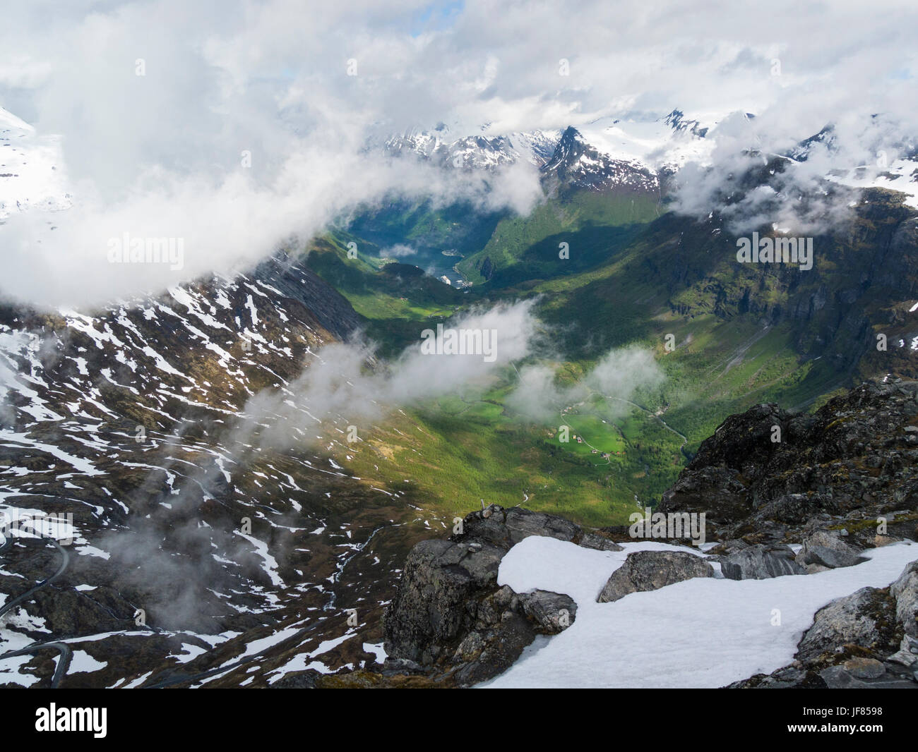Looking down to Geiranger village and Geirangerfjorden from Mount ...