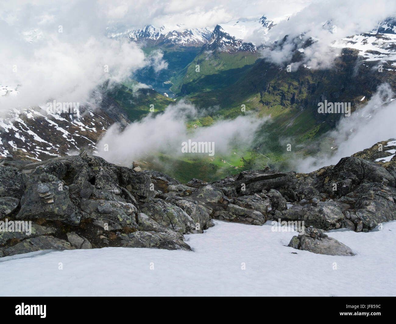 Looking down to Geiranger village and Geirangerfjorden from Mount ...